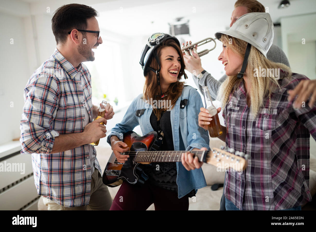 Group of happy friends having fun and party Stock Photo - Alamy