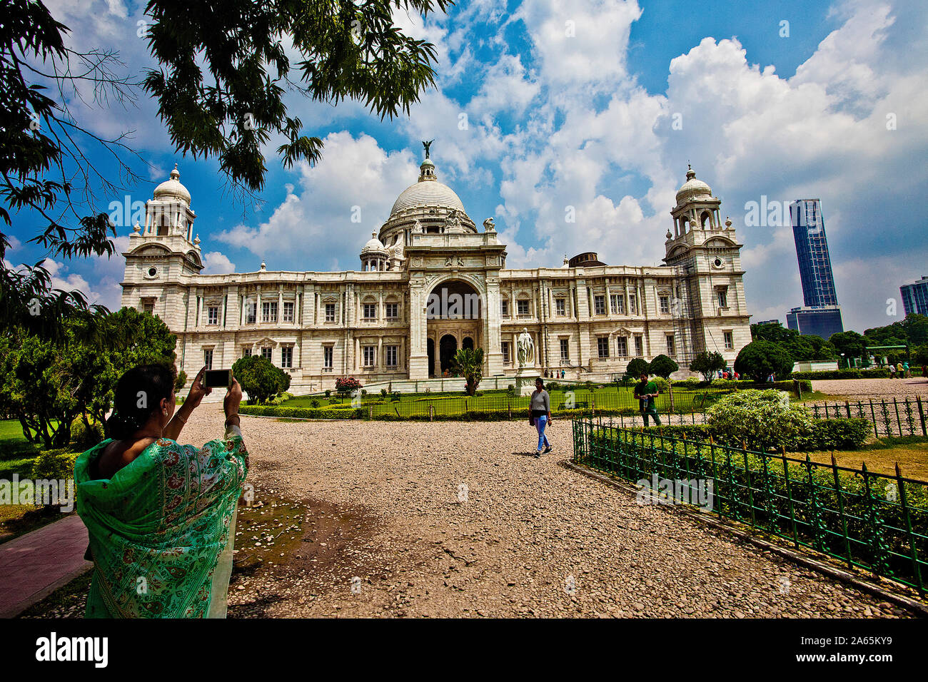 The victoria memorial is a large marble building in kolkata hi-res ...