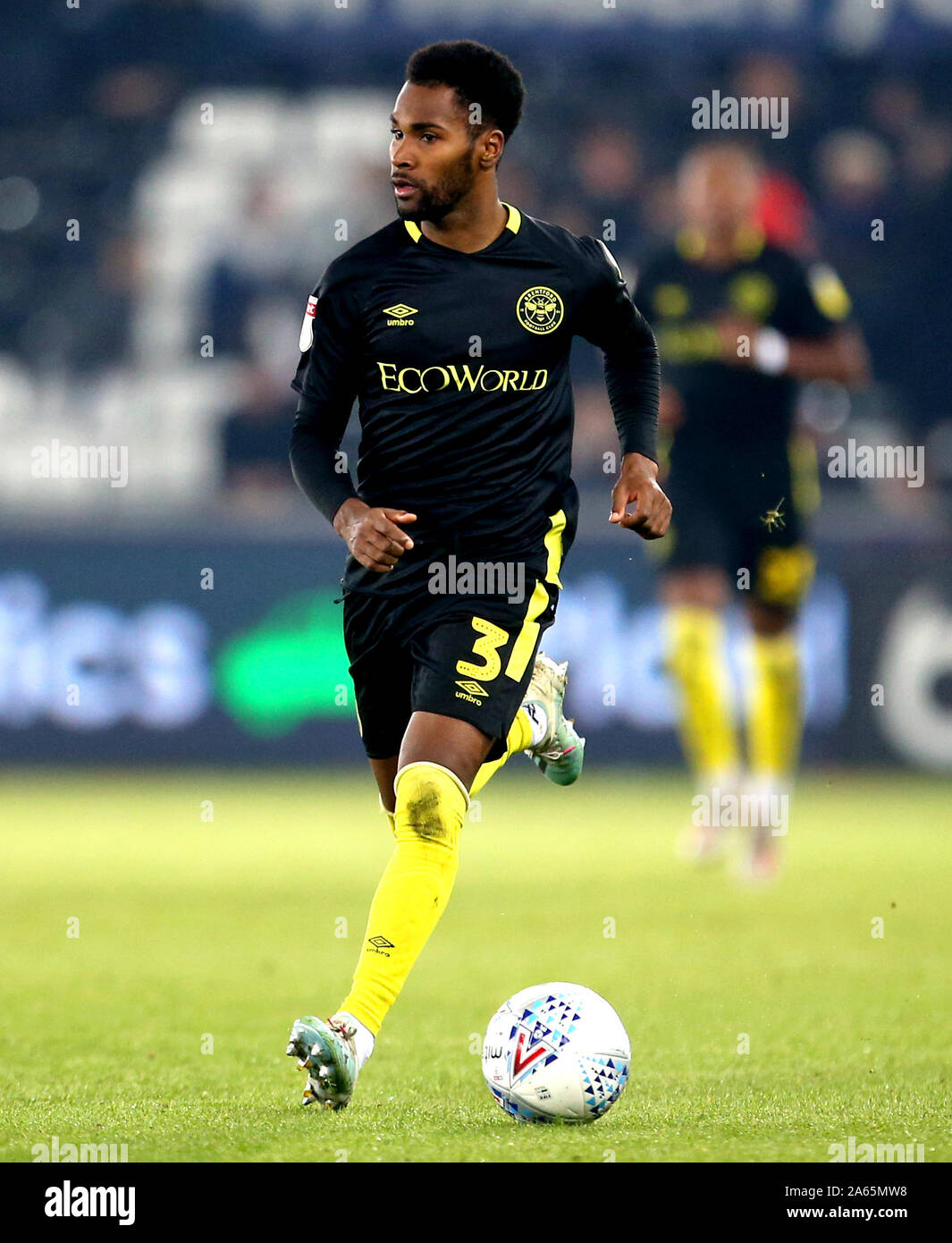Brentford's Rico Henry in action Stock Photo - Alamy