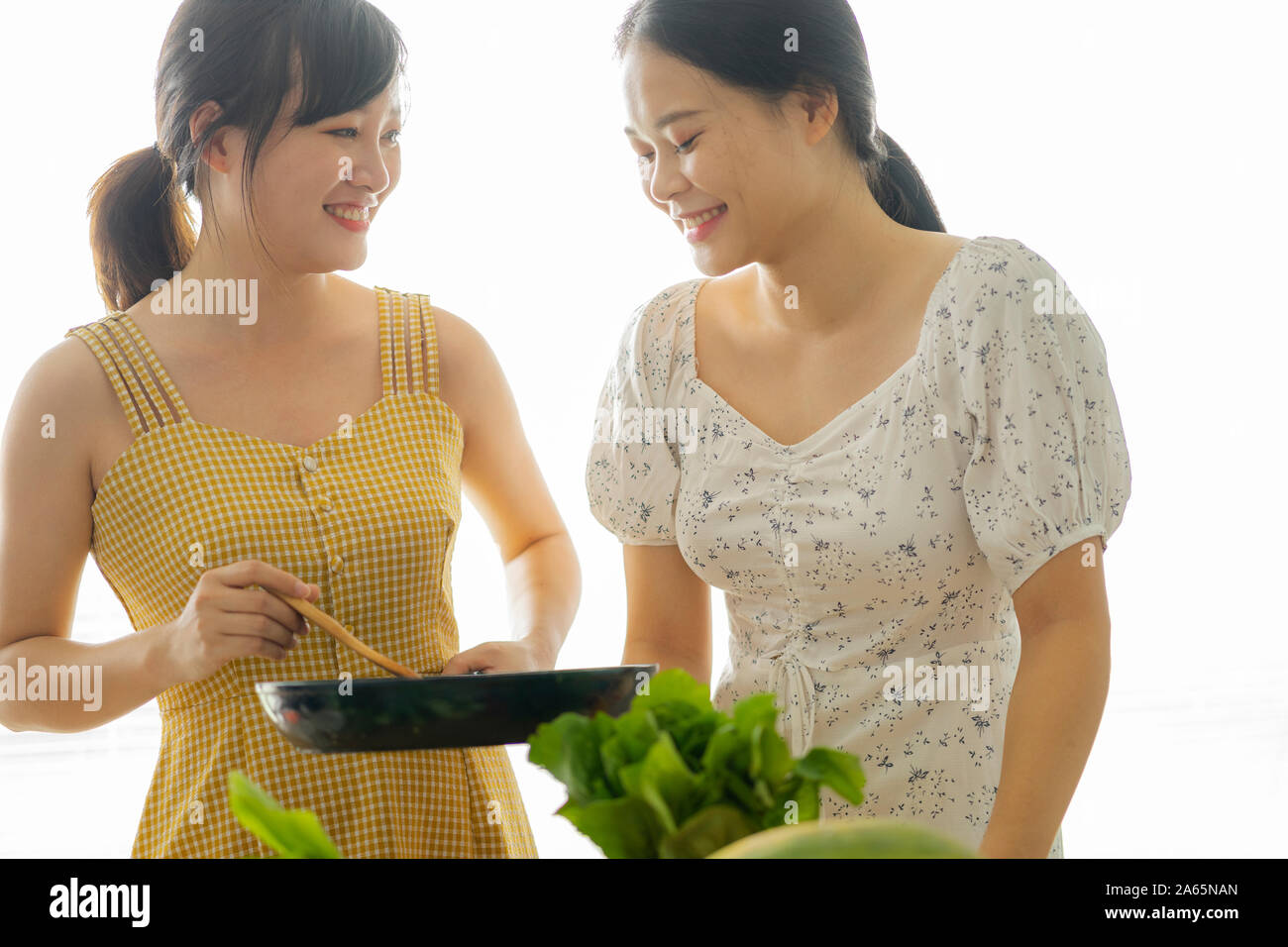 A pretty girl in the kitchen Stock Photo - Alamy