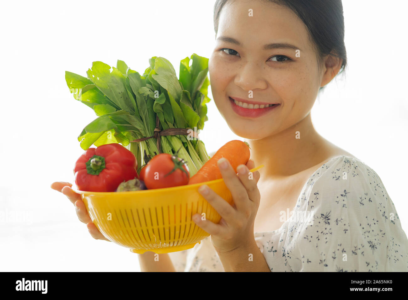 Pretty girls cooking in the kitchen Stock Photo - Alamy