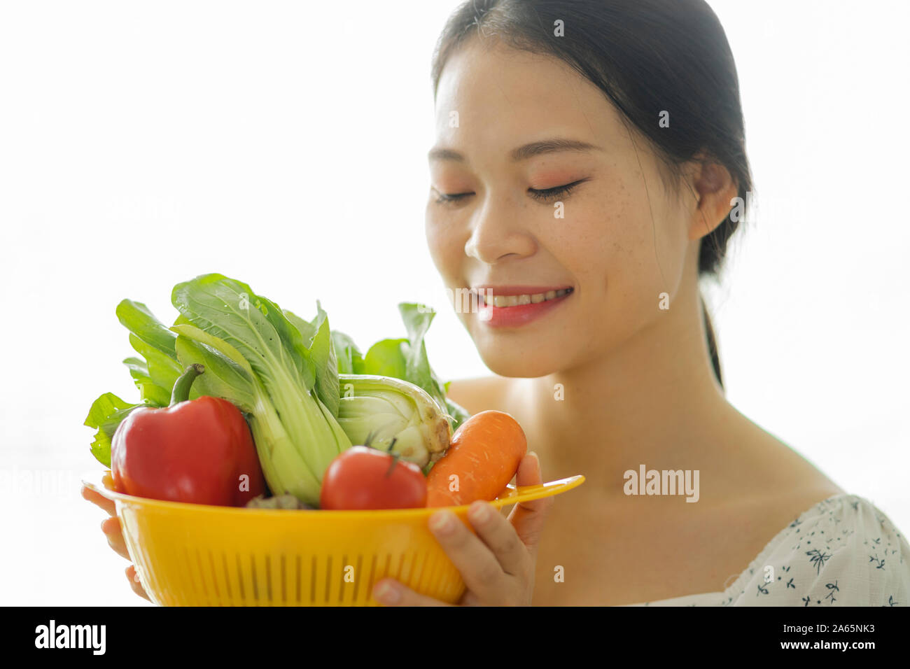 Pretty girls cooking in the kitchen Stock Photo - Alamy