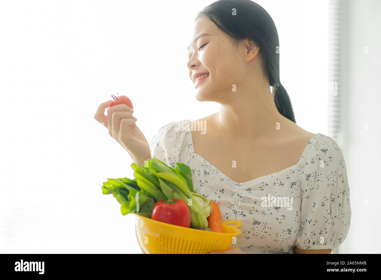 Pretty girls cooking in the kitchen Stock Photo - Alamy