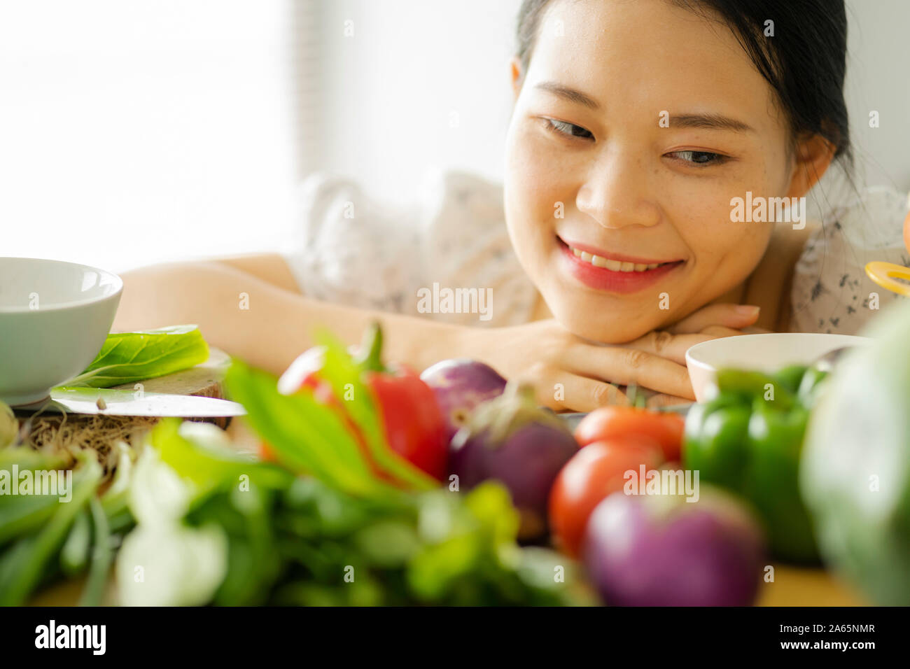 Vietnamese girl cooking hi-res stock photography and images - Alamy