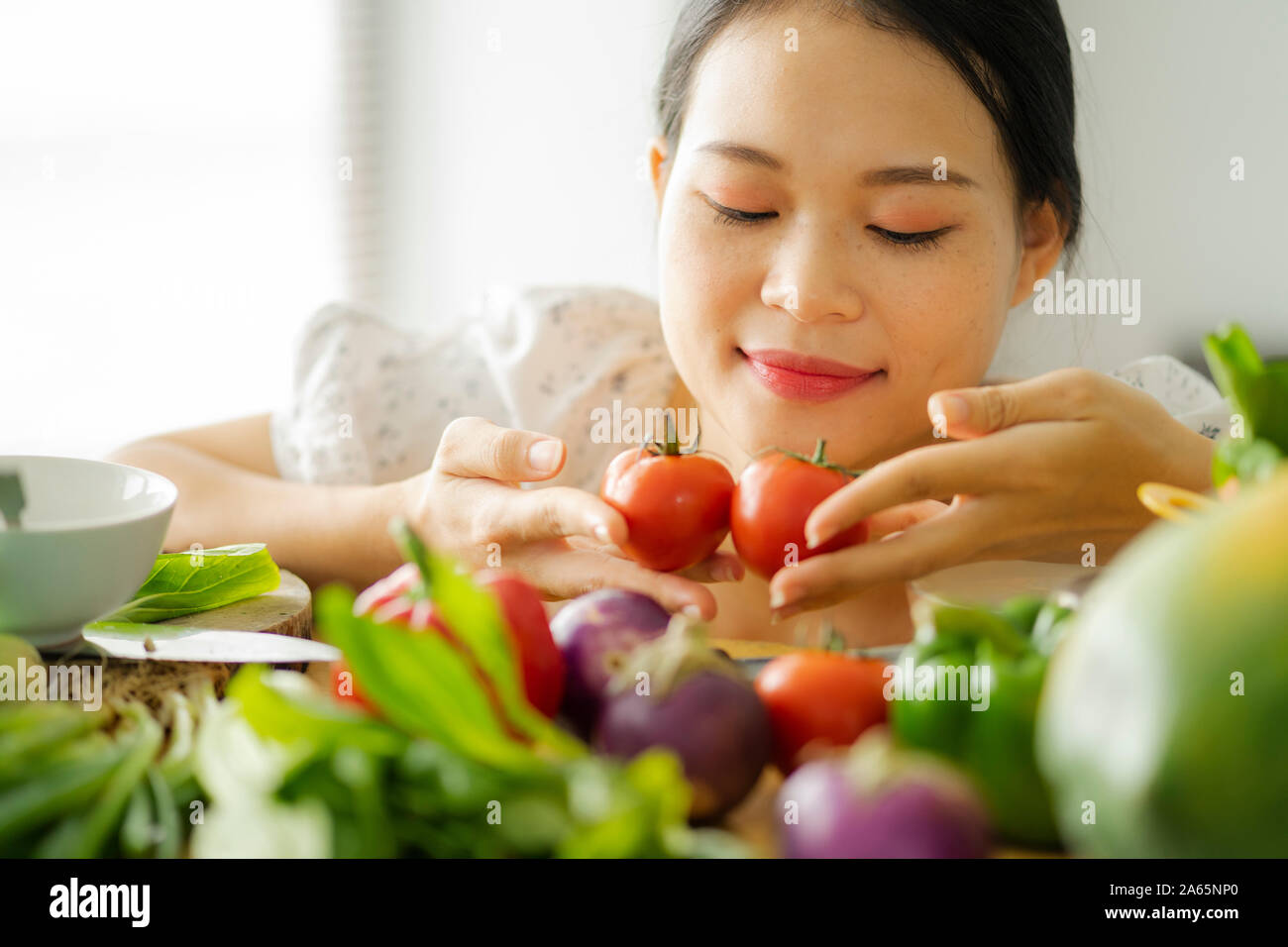 Vietnamese girl cooking hi-res stock photography and images - Alamy