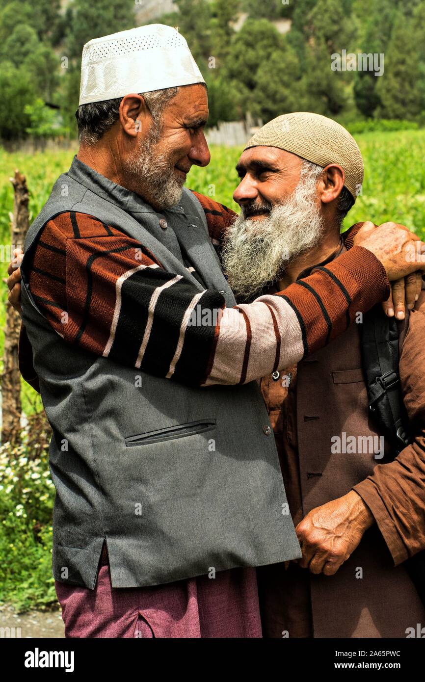 Indian men hugging hi-res stock photography and images - Alamy