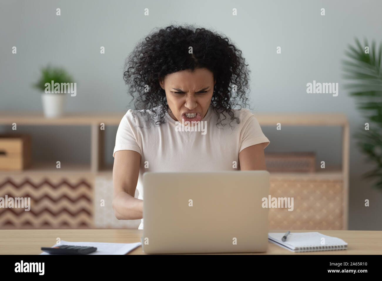 African american woman computer mad hi-res stock photography and images ...