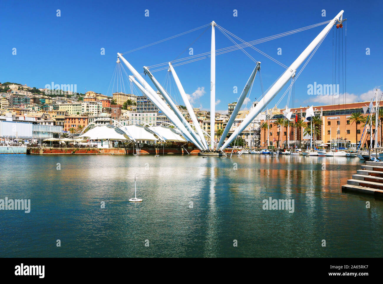 Boats in the ancient port of Genoa Stock Photo - Alamy