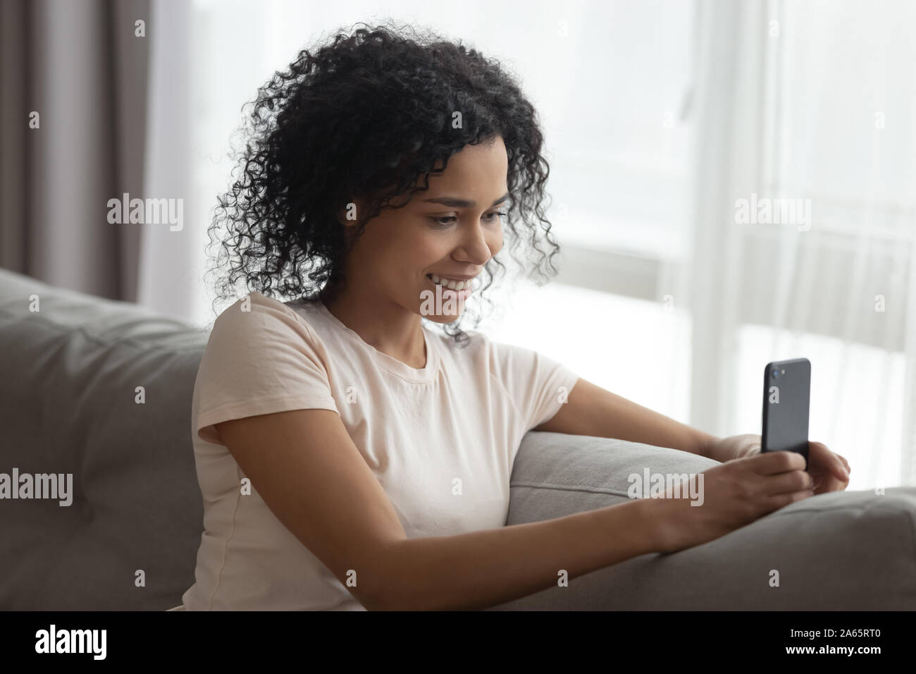 Woman using cellphone camera hi-res stock photography and images - Alamy