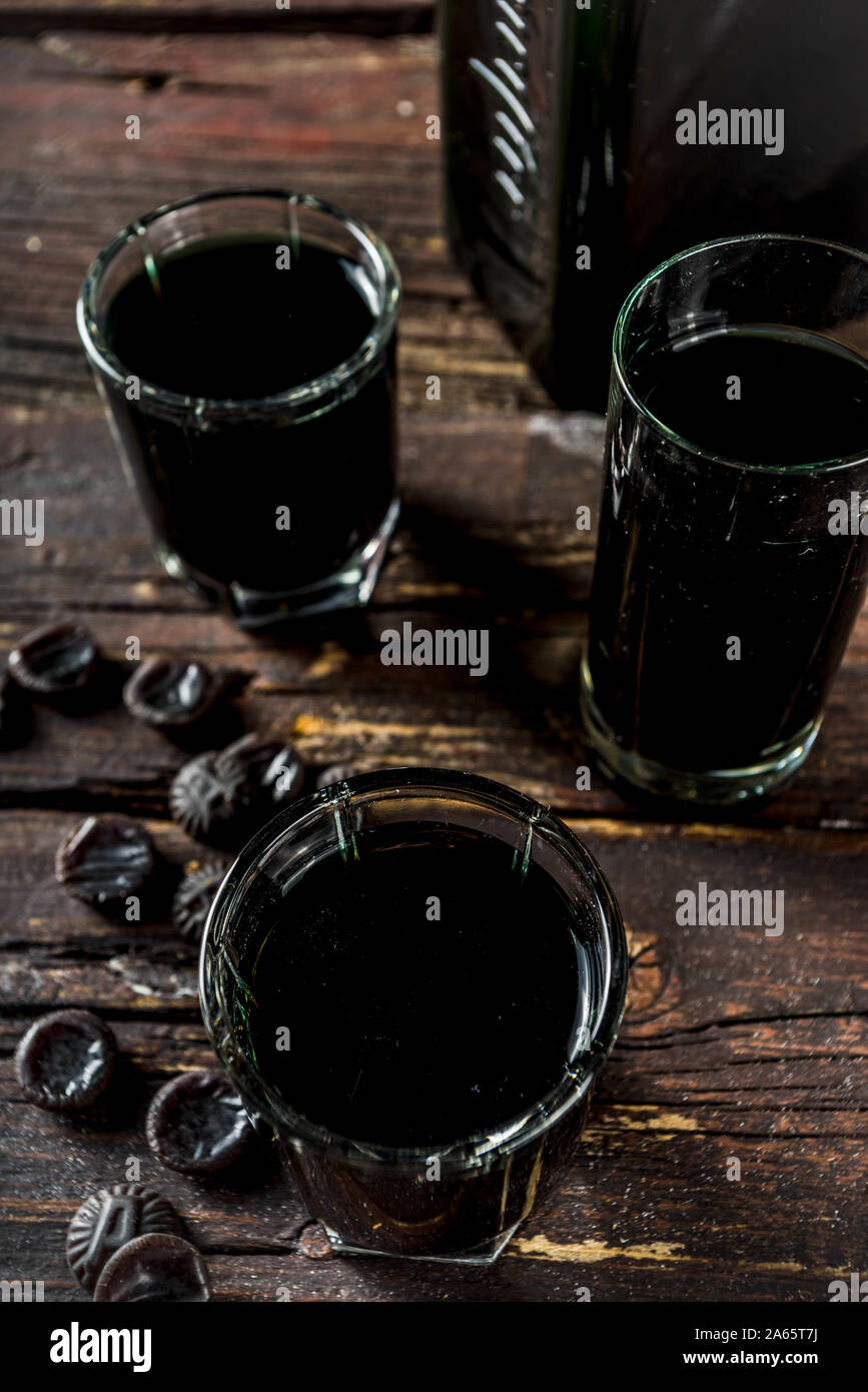 Finnish traditional alcohol. Winter warming drinks. Salmiakkikossu shot ...