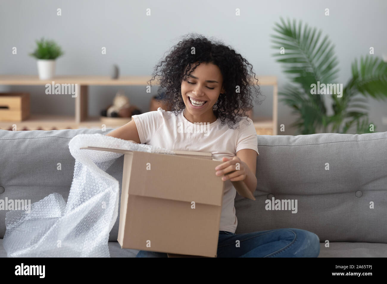 Parcel ethnic hi-res stock photography and images - Alamy