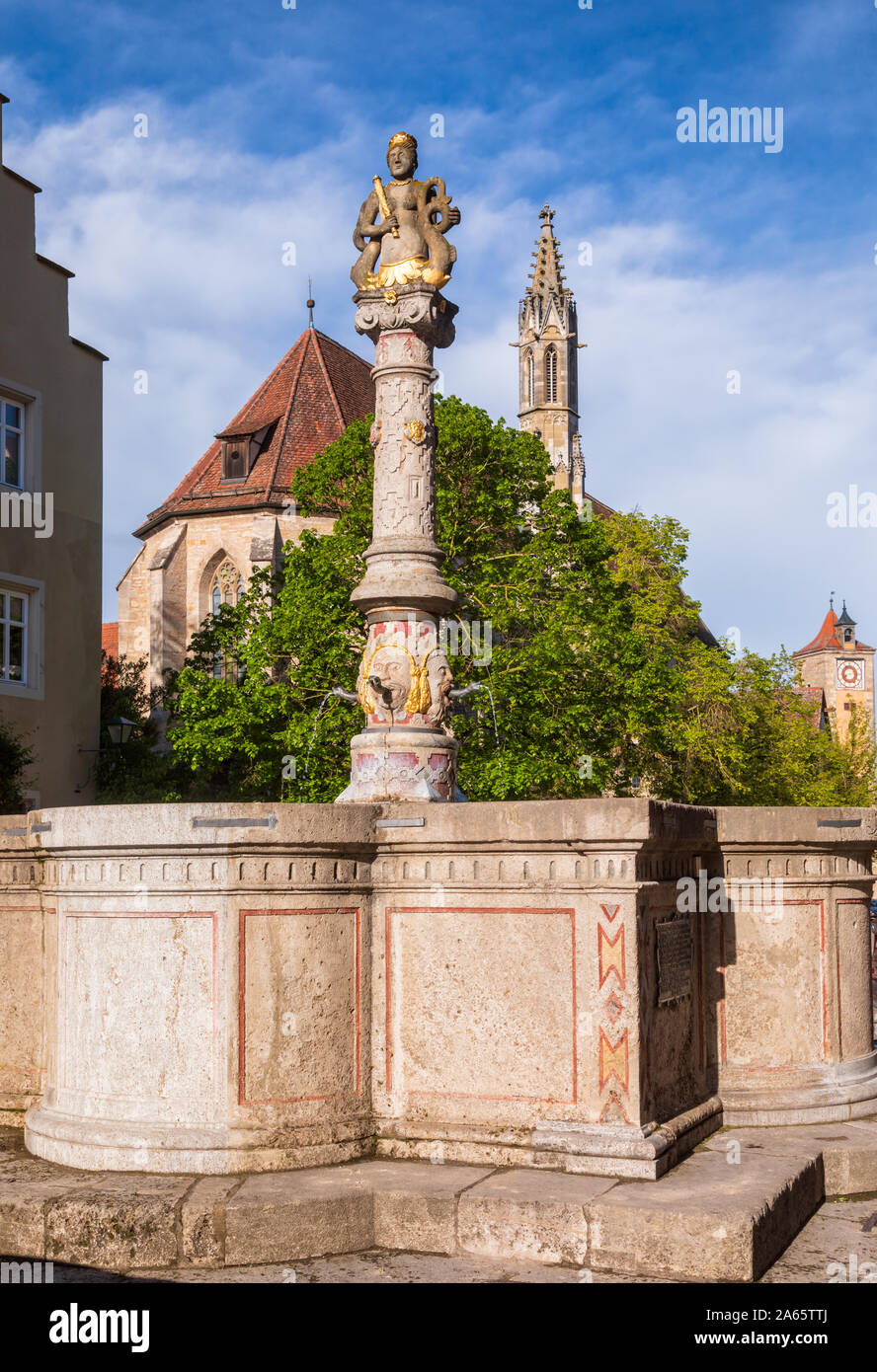 Renaissance Herrnbrunnen spring pillar with mermaid statue on top at ...