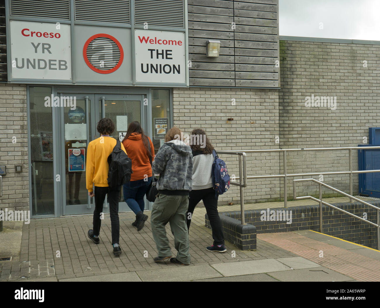 Students by the Student's Union at the campus of Aberystwyth University ...