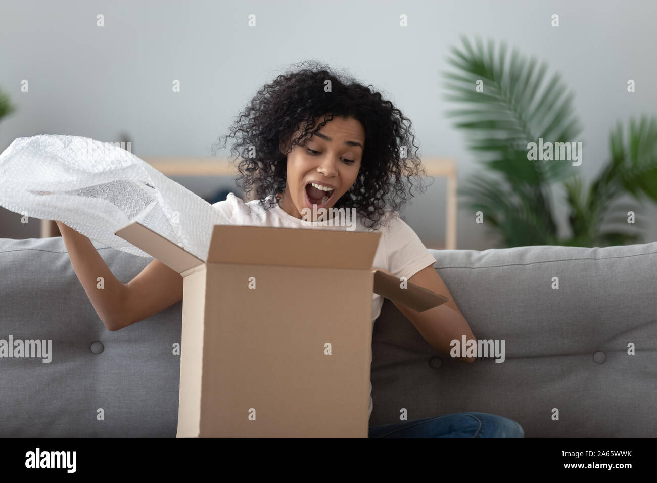 Opening package hi-res stock photography and images - Alamy