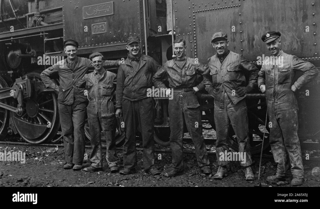 American and British railroad crews who are taking supplies for Russia ...