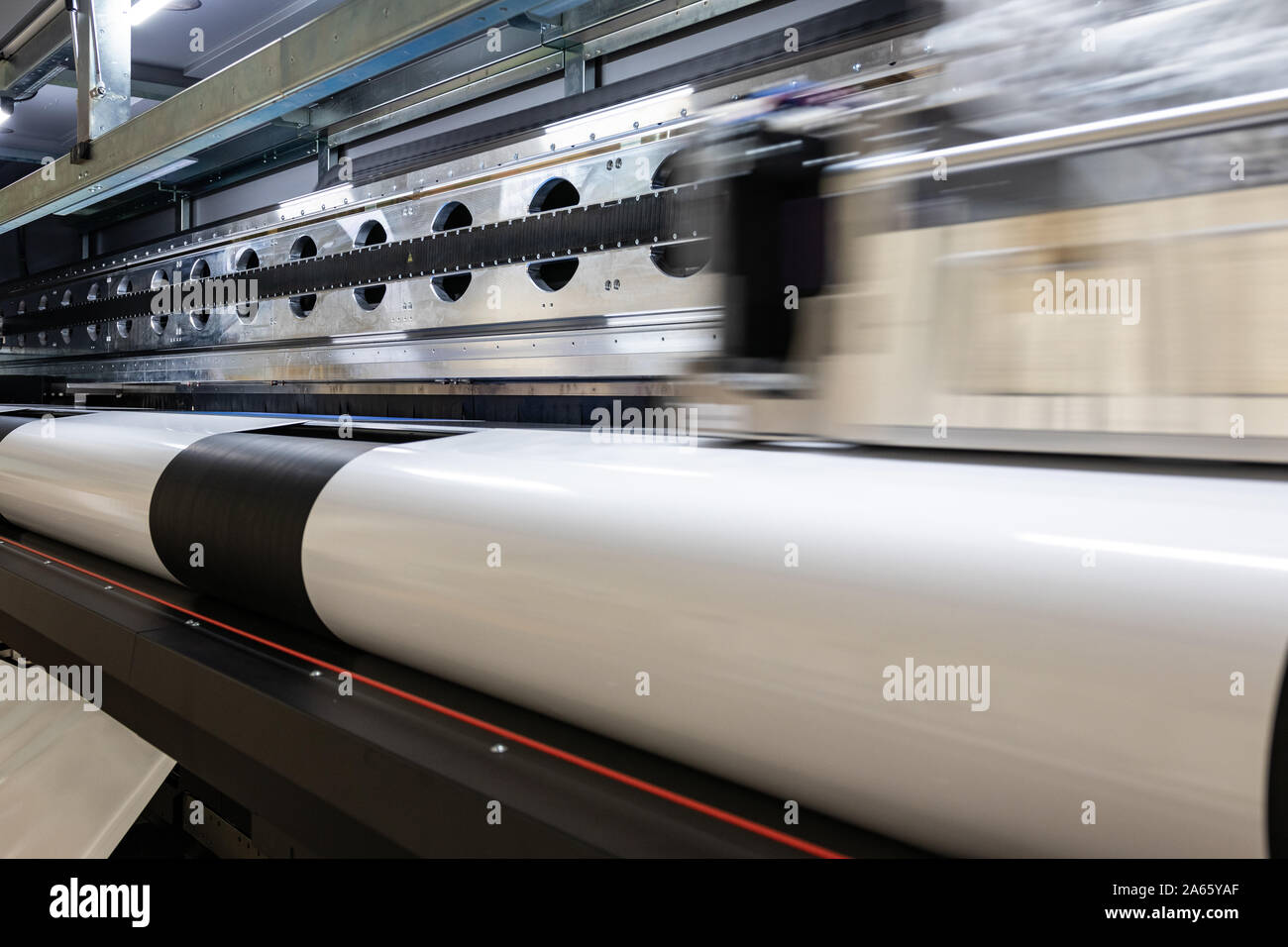 Details of a moving print head. Massive machinery. Professional ...