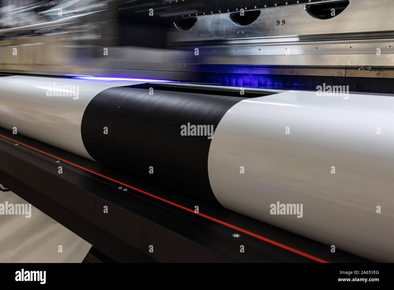 Details of a moving print head. Massive machinery. Professional ...