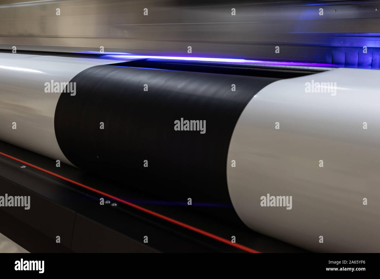 Details of a moving print head. Massive machinery. Professional ...