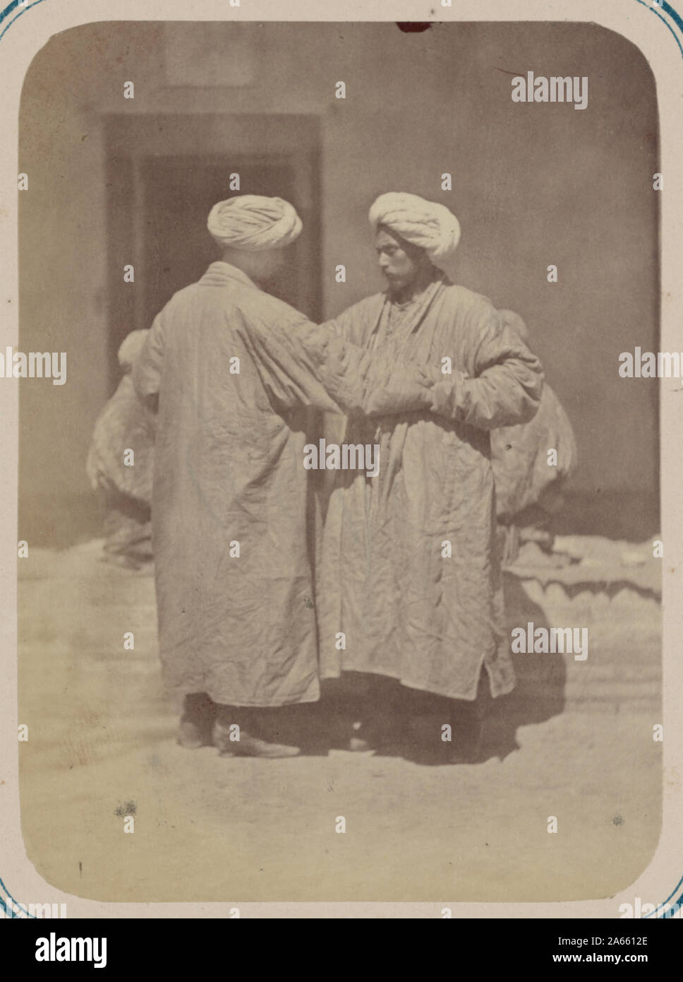 Customs of Central Asians Two Men Greeting Each Other Stock Photo - Alamy