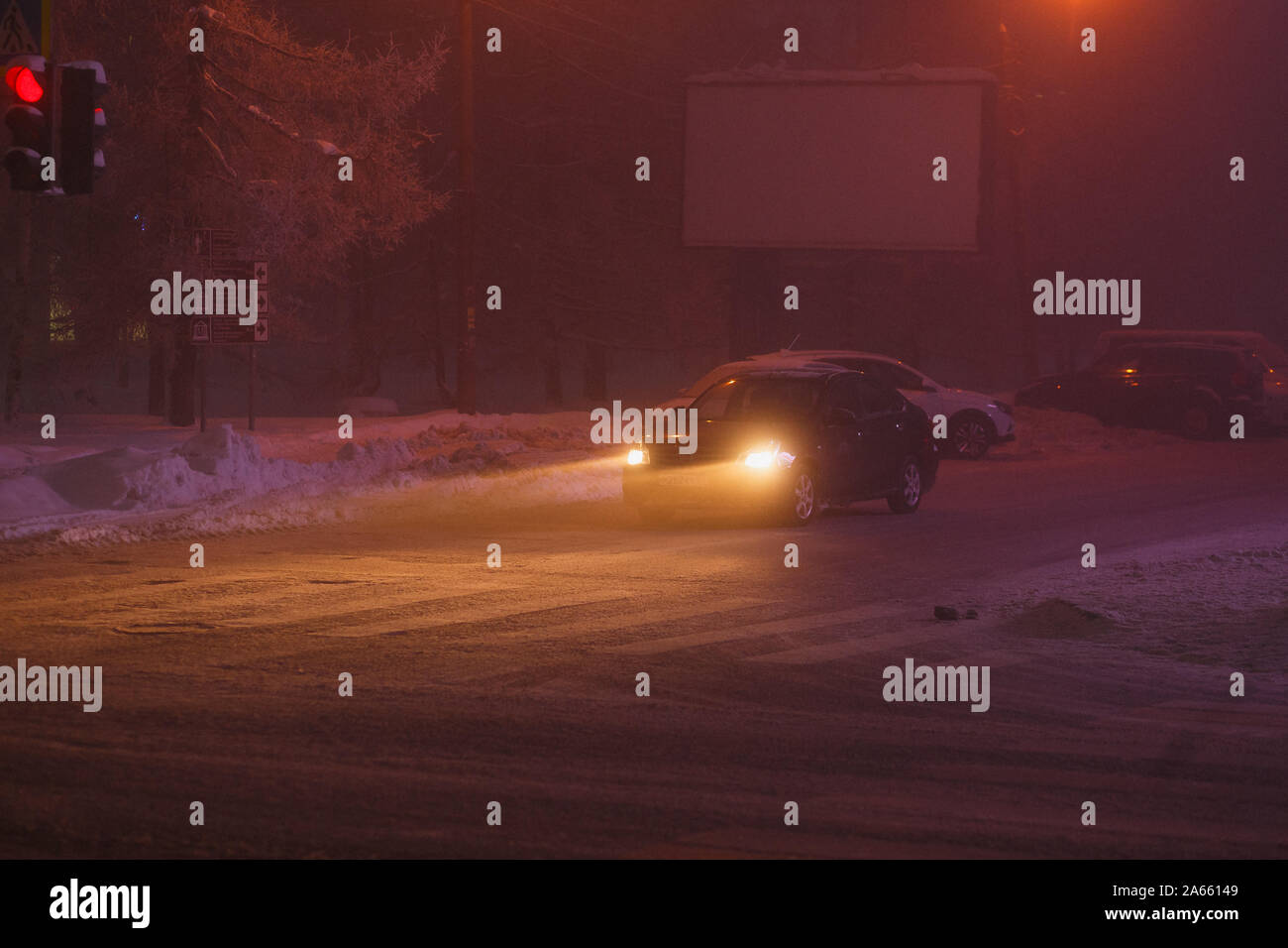 Car headlights dusk urban hi-res stock photography and images - Alamy