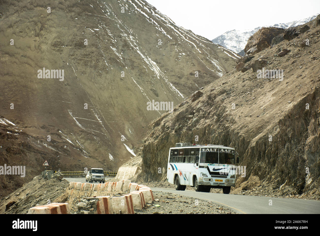 JAMMU KASHMIR, INDIA - MARCH 21 : Indian people drive car and bus on ...