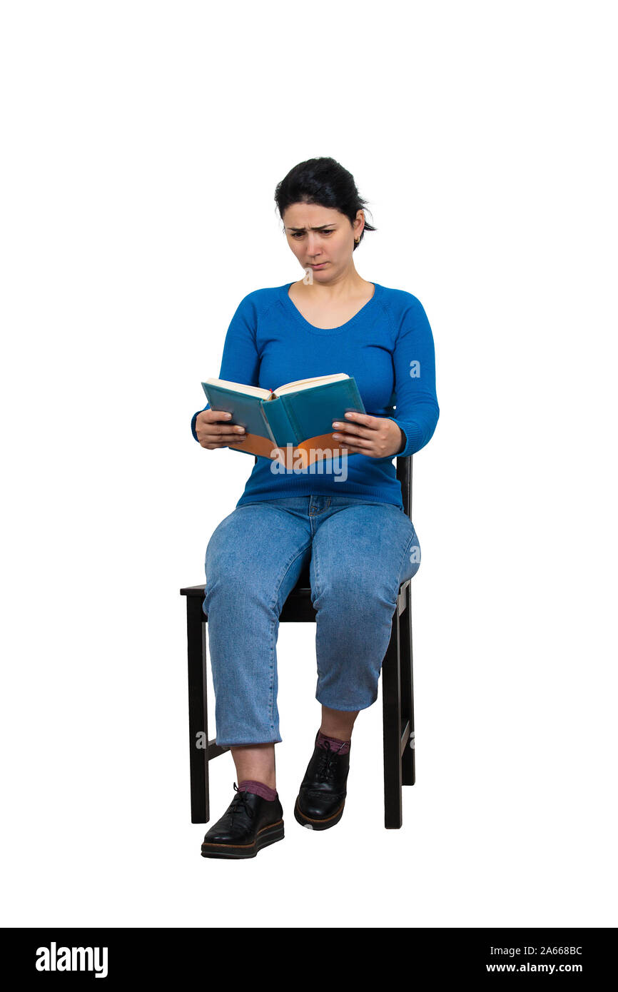Puzzled woman reader looking amazed in a book. Confused student girl ...