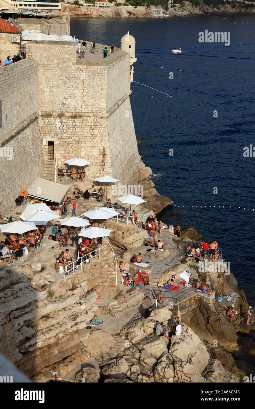 Croatia, Dubrovnik, city walls, people, sunbathing, beach Stock Photo ...