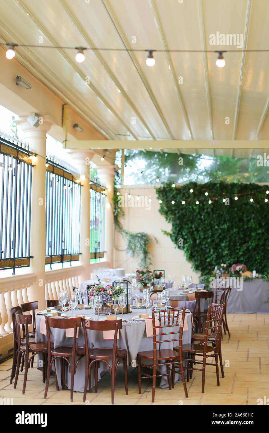 Banquet served tables at restaurant in open air Stock Photo - Alamy