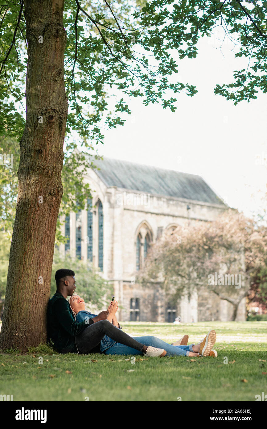 Sitting between legs hi-res stock photography and images - Alamy