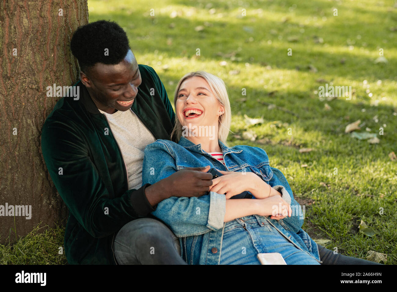 Sitting between legs hi-res stock photography and images - Alamy