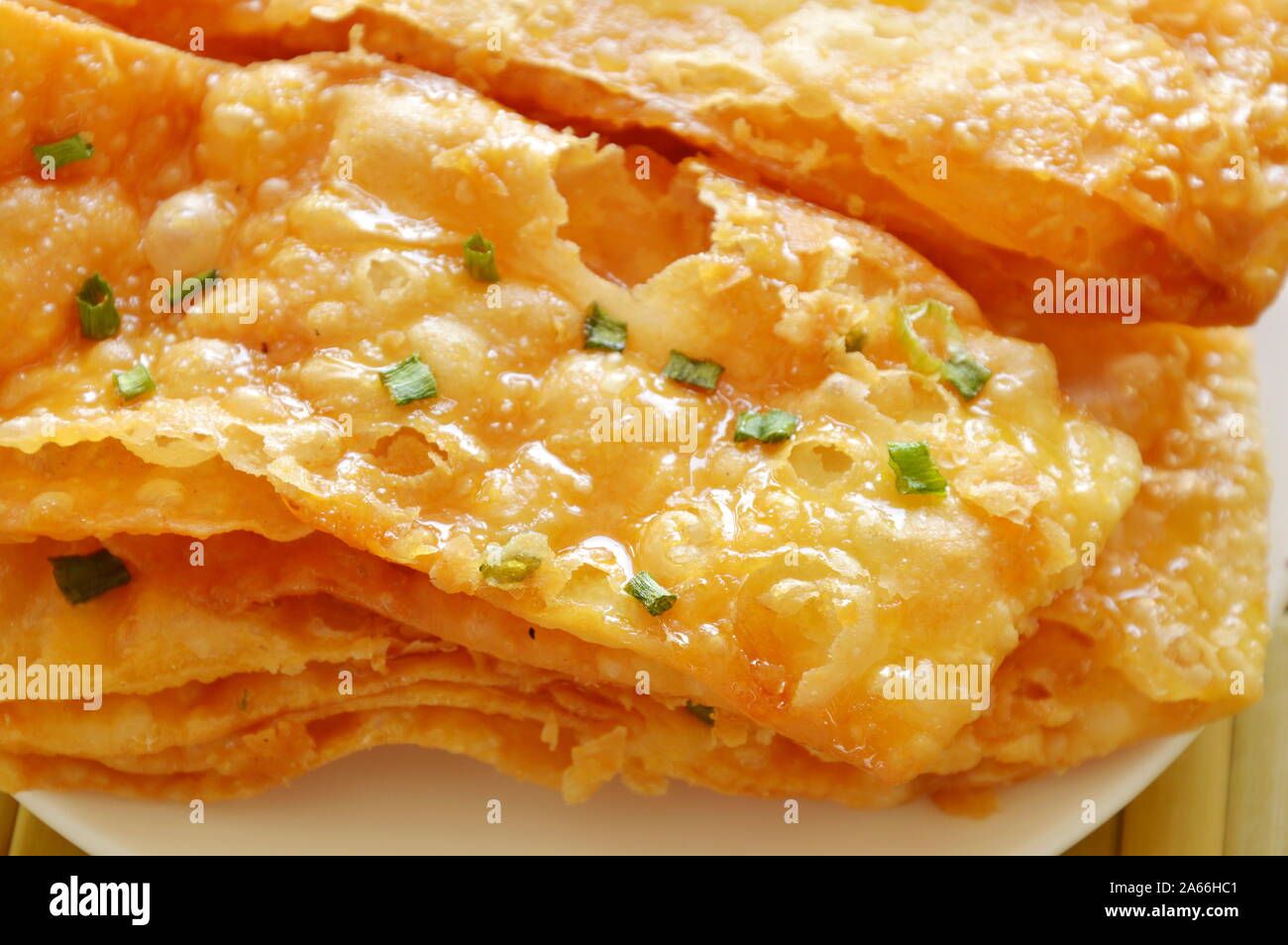 crispy sweet Roti Indian food made of flour on dish Stock Photo - Alamy