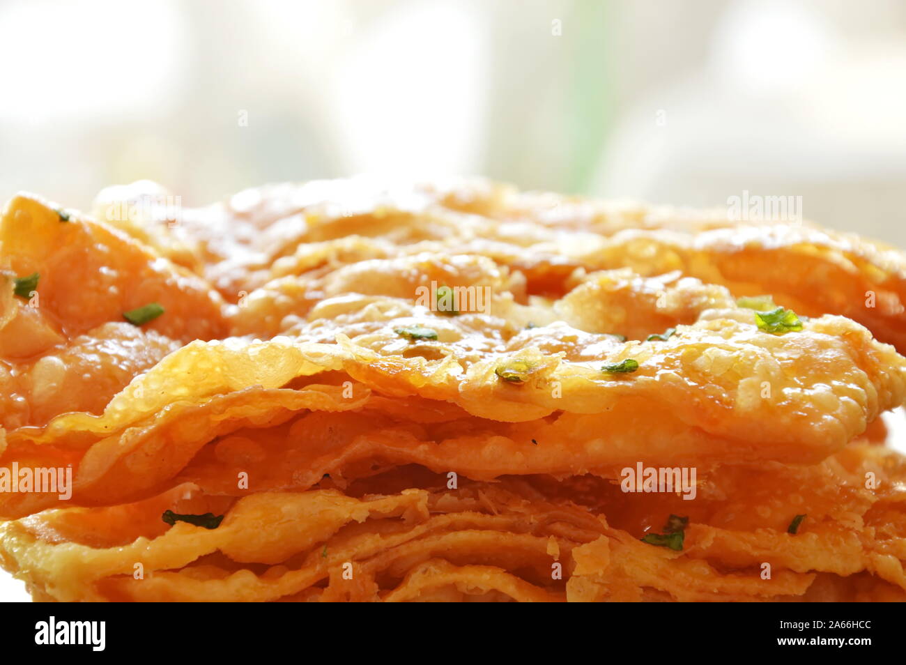 crispy sweet Roti Indian food made of flour on dish Stock Photo - Alamy