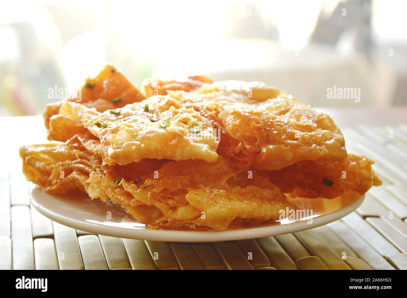 crispy sweet Roti Indian food made of flour on dish Stock Photo - Alamy