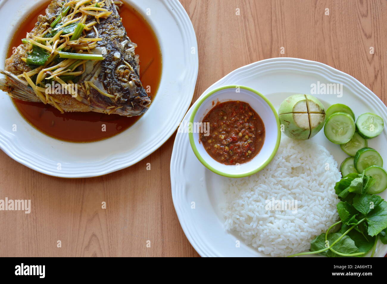 fried mango fish head dressing ginger soy sauce eat with rice and spicy ...