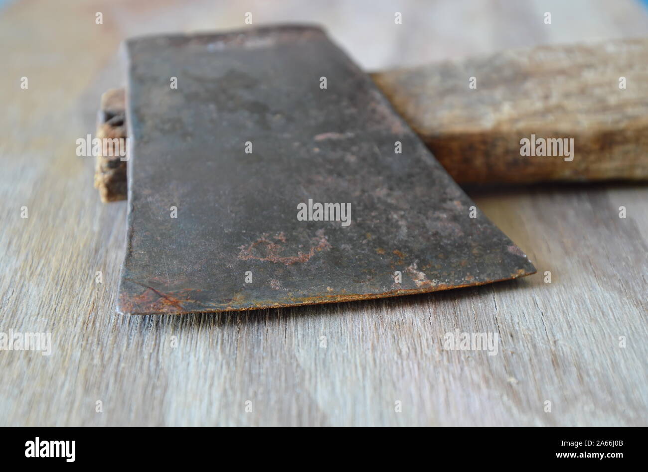 iron ax blade with wooden handle on plank Stock Photo - Alamy