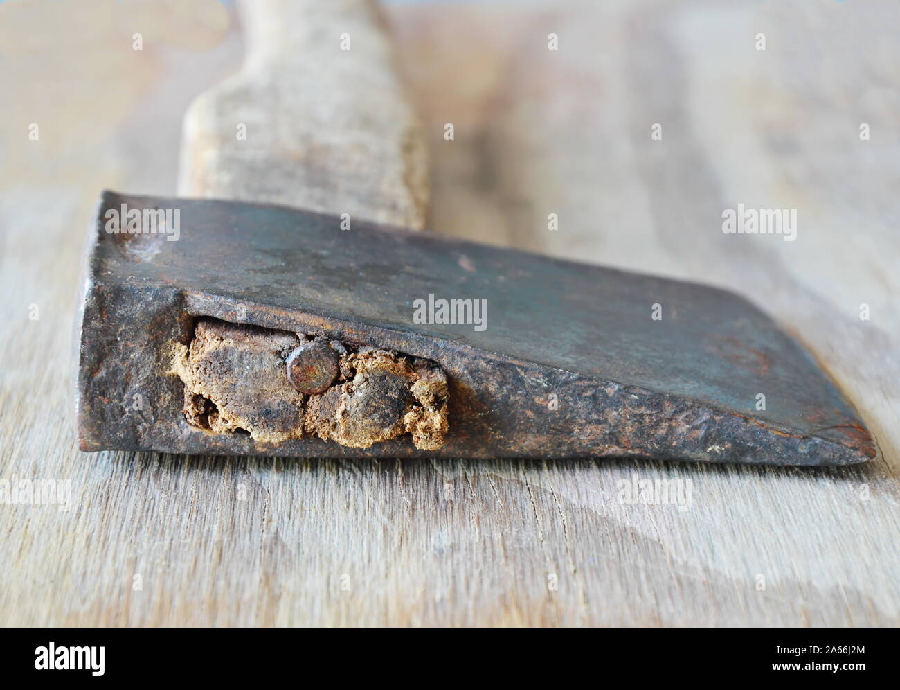 iron ax blade with wooden handle on plank Stock Photo - Alamy