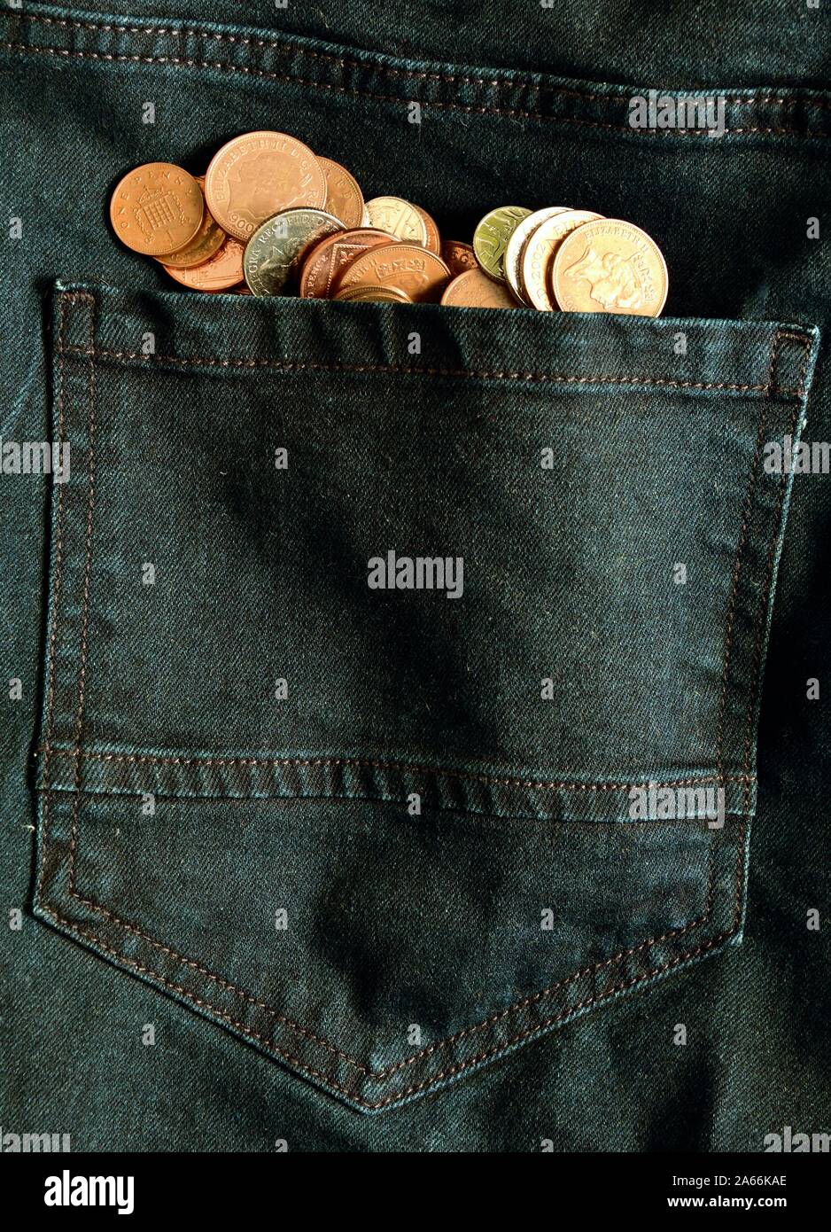 Money bulging in pocket hi-res stock photography and images - Alamy