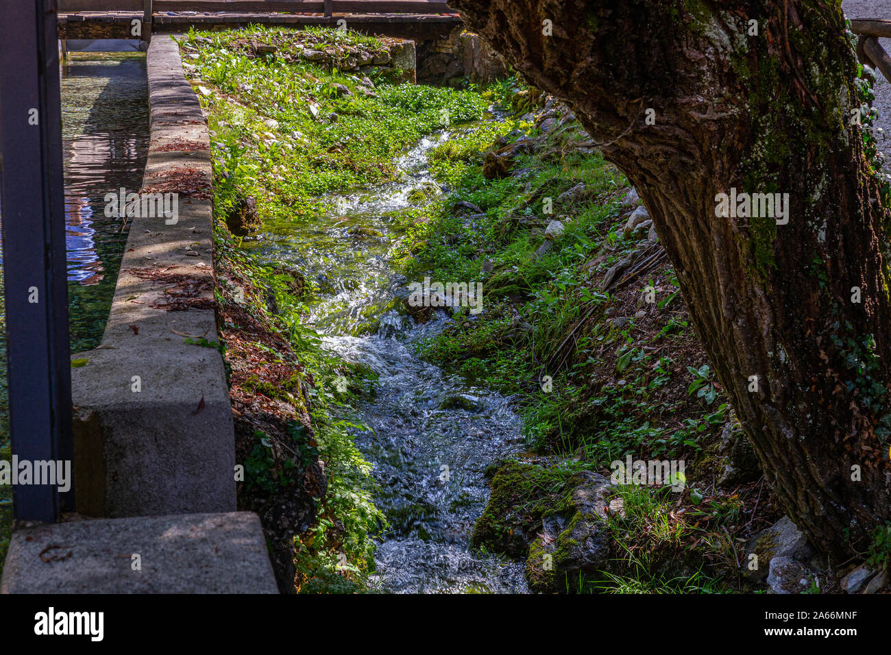 Typical Italian medieval town with a river flowing through it Stock ...