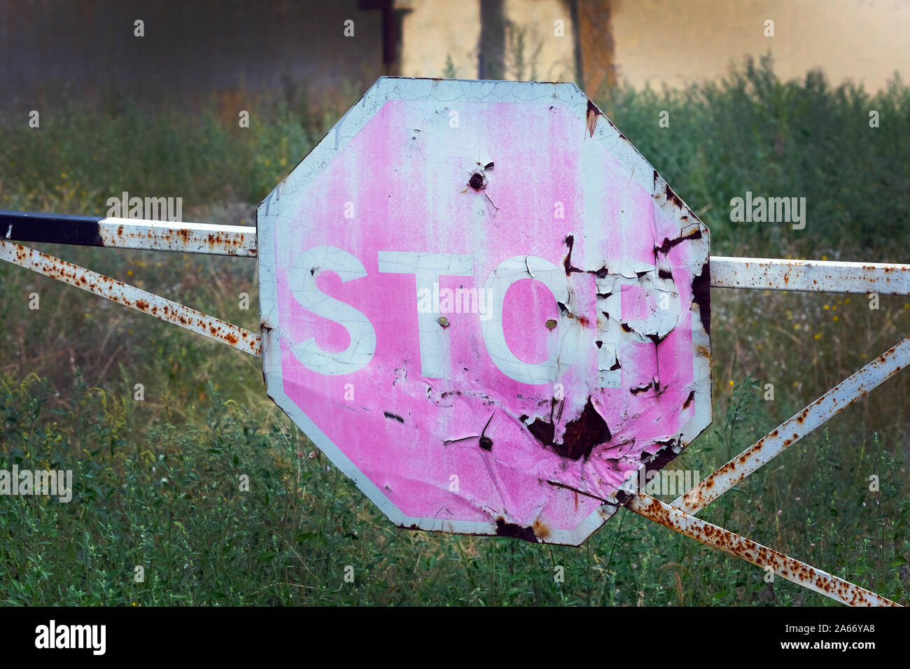 An old octagonal traffic sign without stopping is prohibited. Against ...