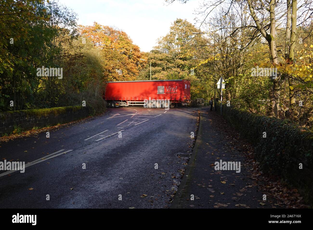 A long articulated lorry makes a tight right-hand turn from Watford ...