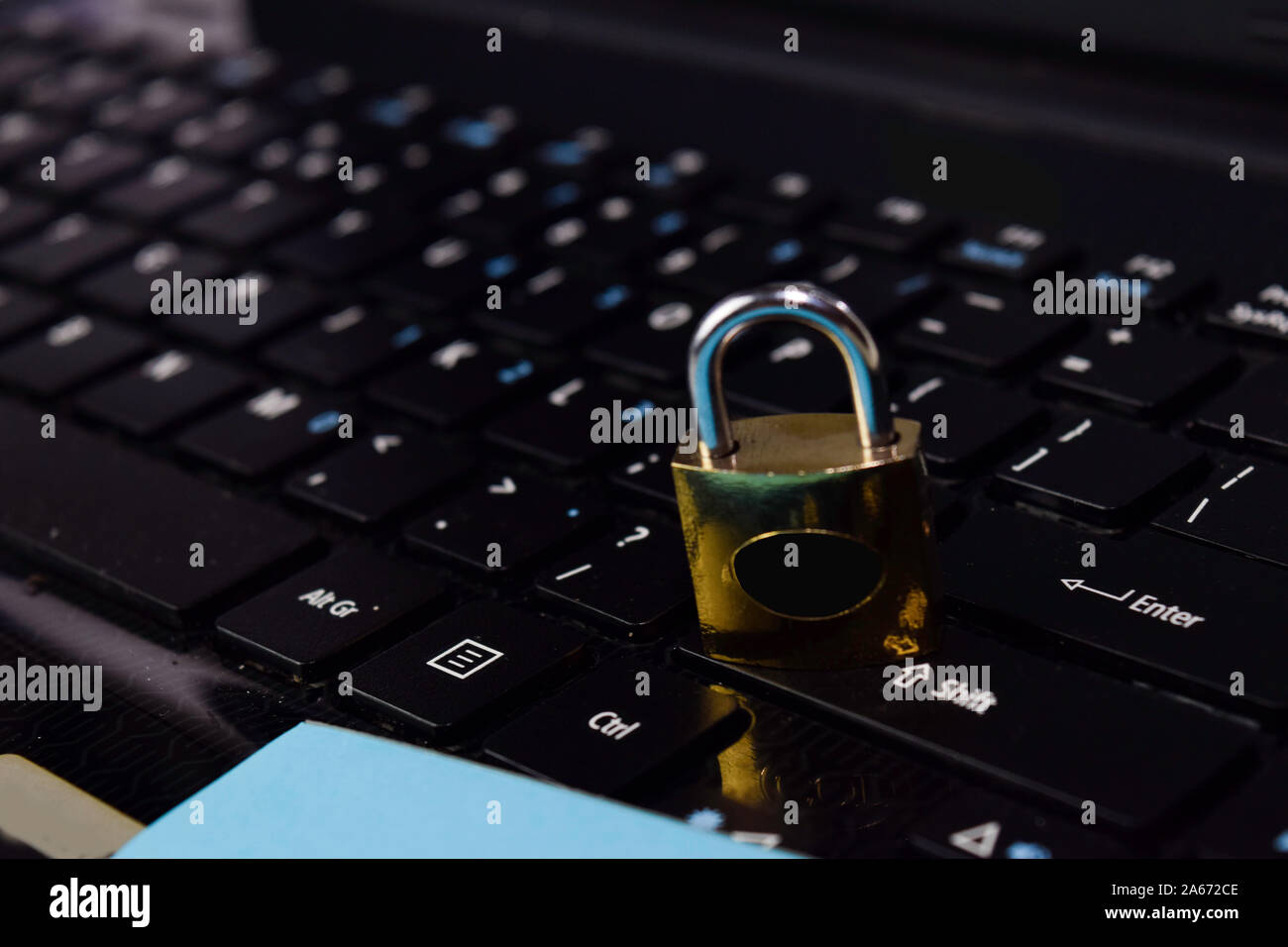 gold padlock. digital data protection isolated on laptop keyboard ...