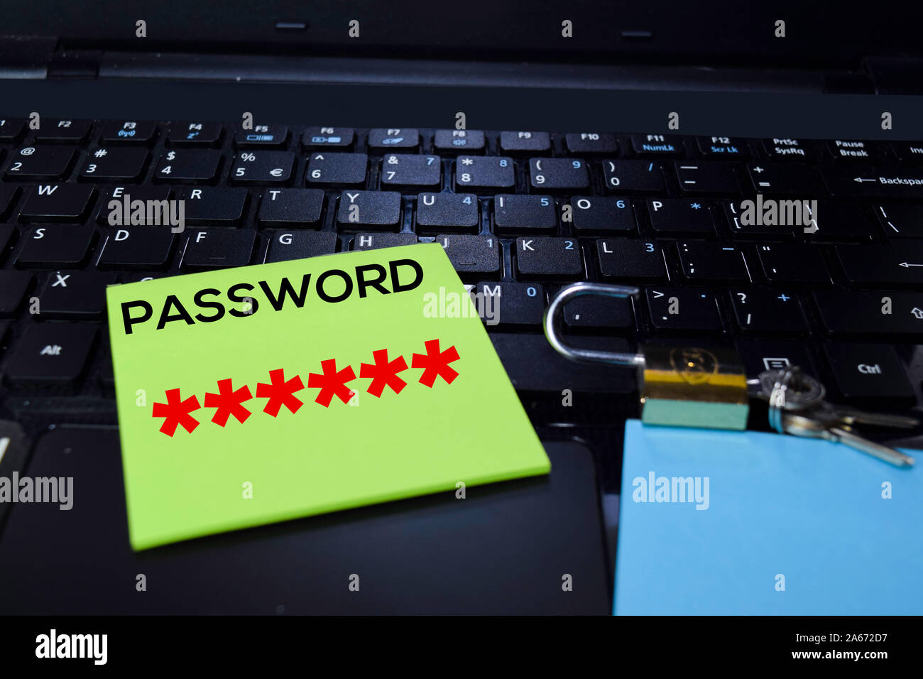 Strong Password on sticky Notes isolated on laptop keyboard background ...