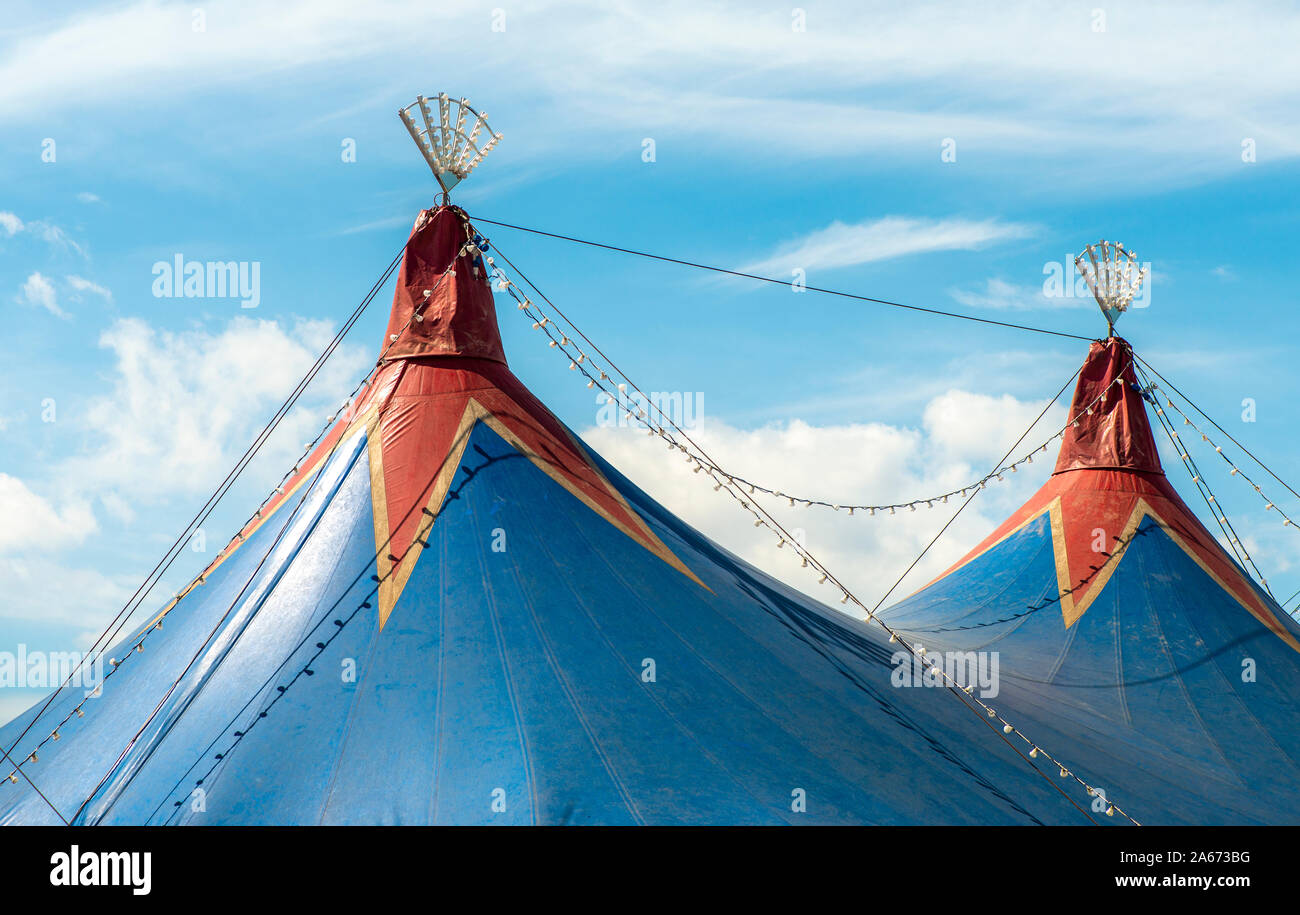 Blue dome of the circus and blue sky. Entertainment concept Stock Photo ...