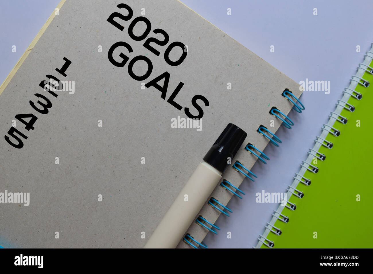 2020 Goals write on sticky notes. Isolated on white table background ...