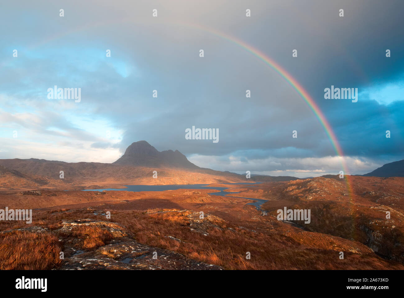 Rainbow in Sutherland wilderness, Suilven mountain behind Stock Photo ...