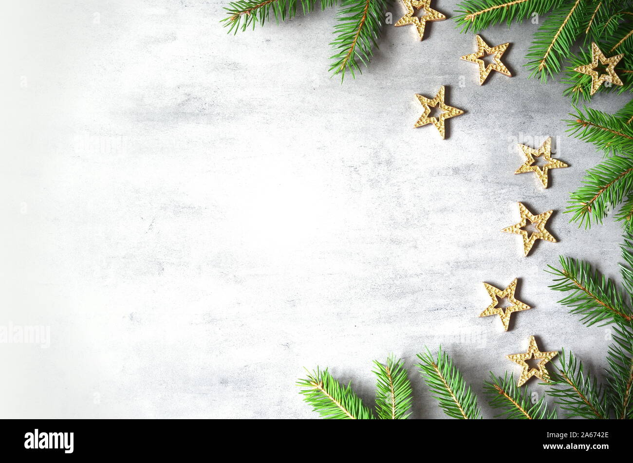Christmas background with decorations and yellow stars on the gray ...