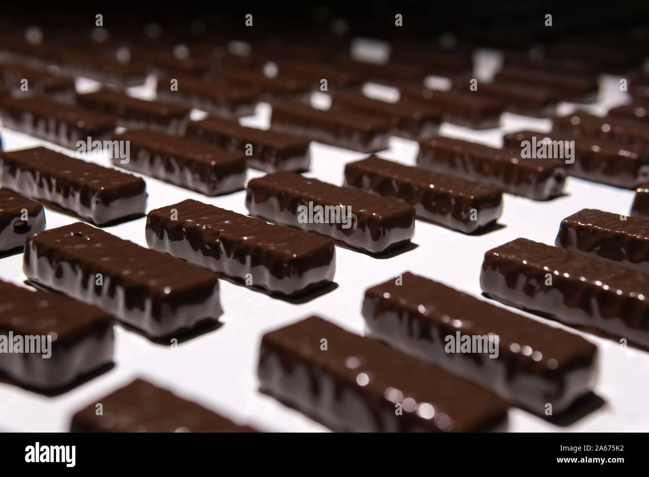 Conveyor belt chocolate factory production hi-res stock photography and ...