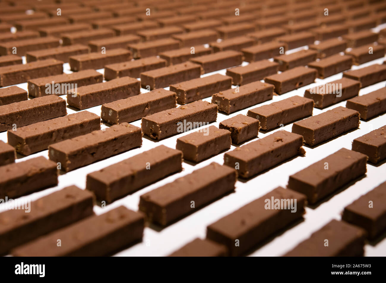 fillings for sweets before pouring with liquid chocolate move on the ...