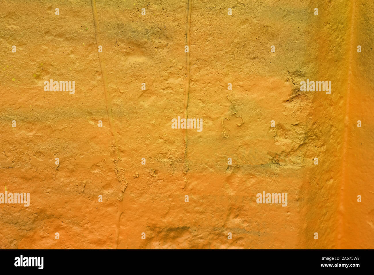 texture of a painted wall. cement plate yellow color background. wall ...