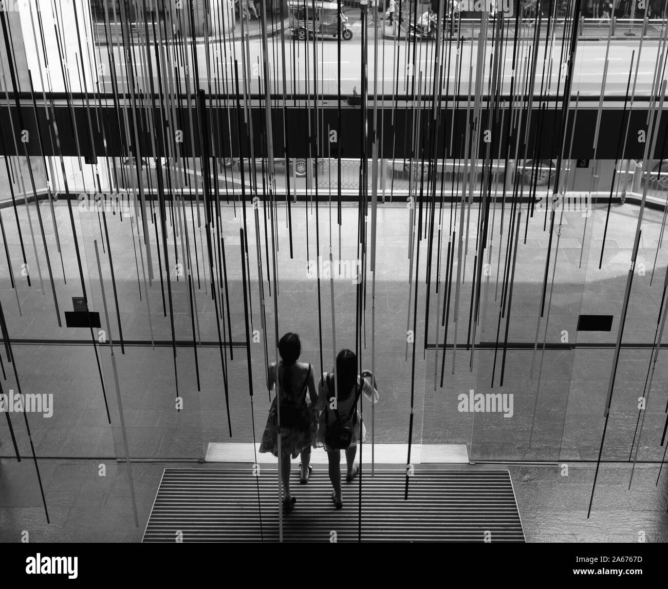 Bangkok,Thailand-02 APR 2018: women go out Pass through the glass gate ...